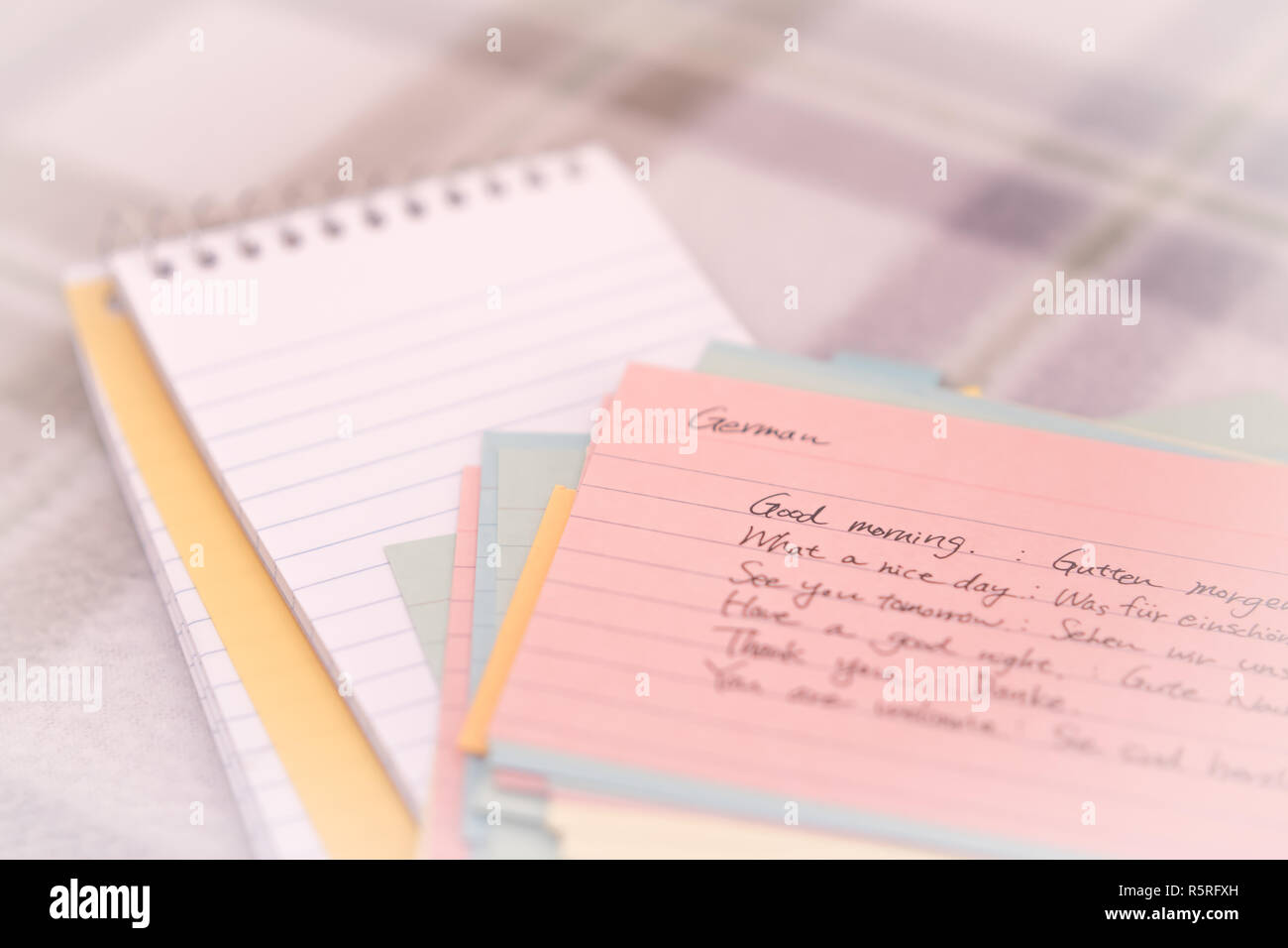 German Learning New Language Writing Greetings on the Notebook Stock ...