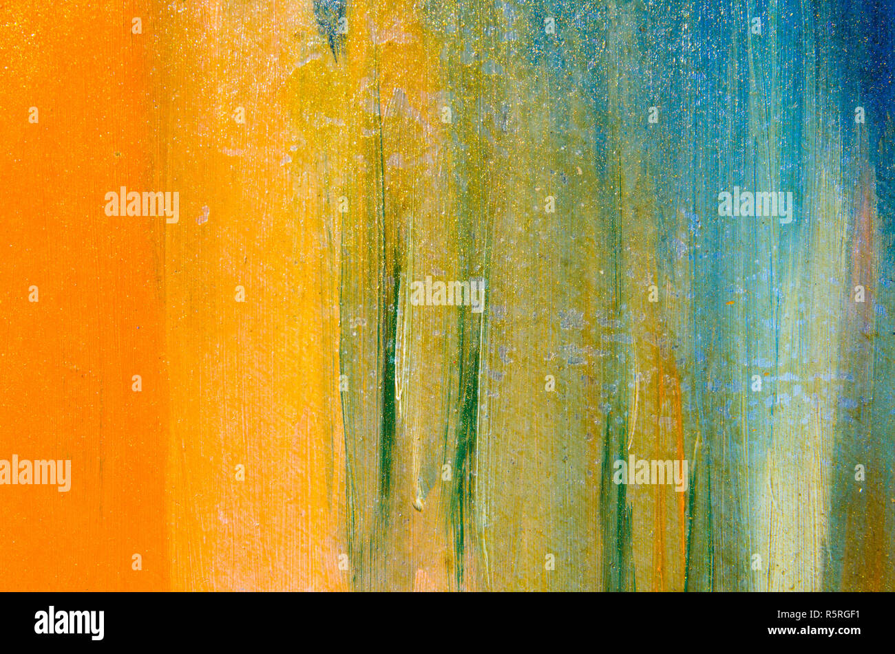 The orange and blue paint form a green color Stock Photo - Alamy