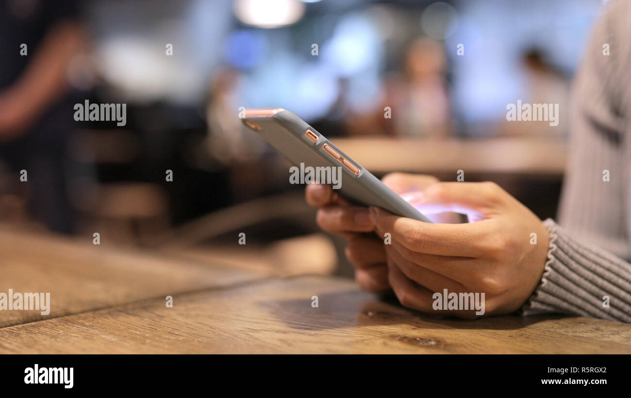 Human hands holding phone sending sms hi-res stock photography and ...