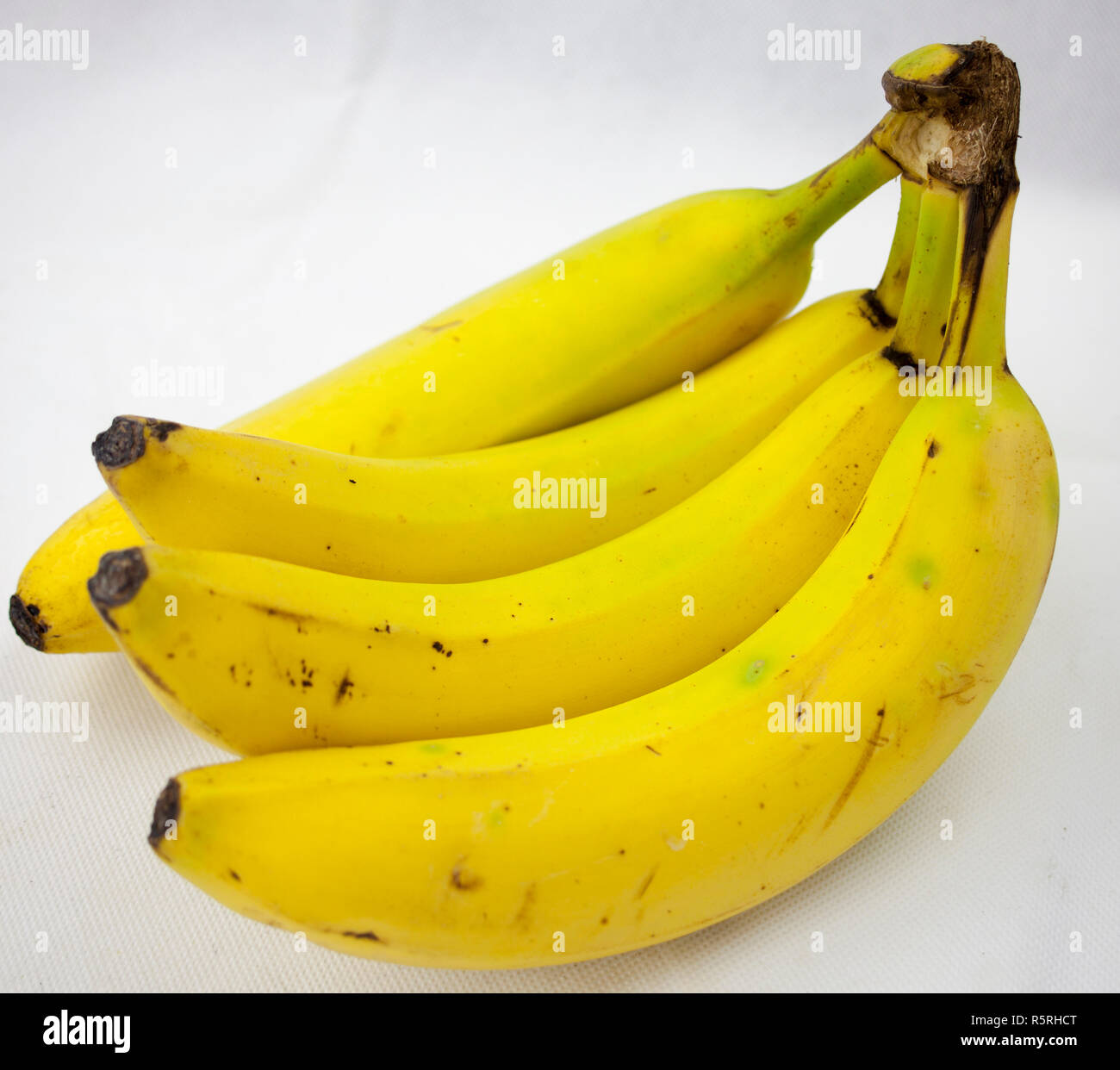 A bunch of four banana, bananas isolated on white background Stock ...
