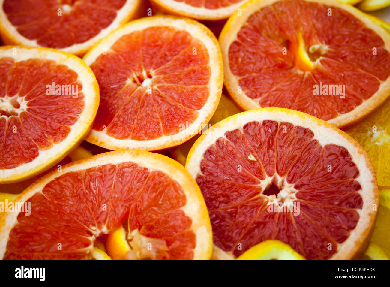 Grapefruit slices background texture Stock Photo - Alamy