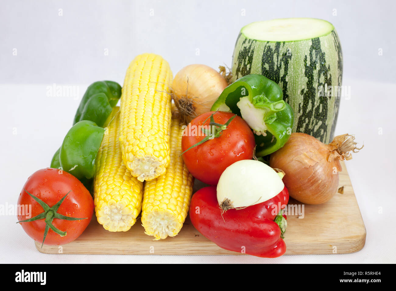 A bunch of vegetables and fruits including tomato Zucchini, Courgette ...