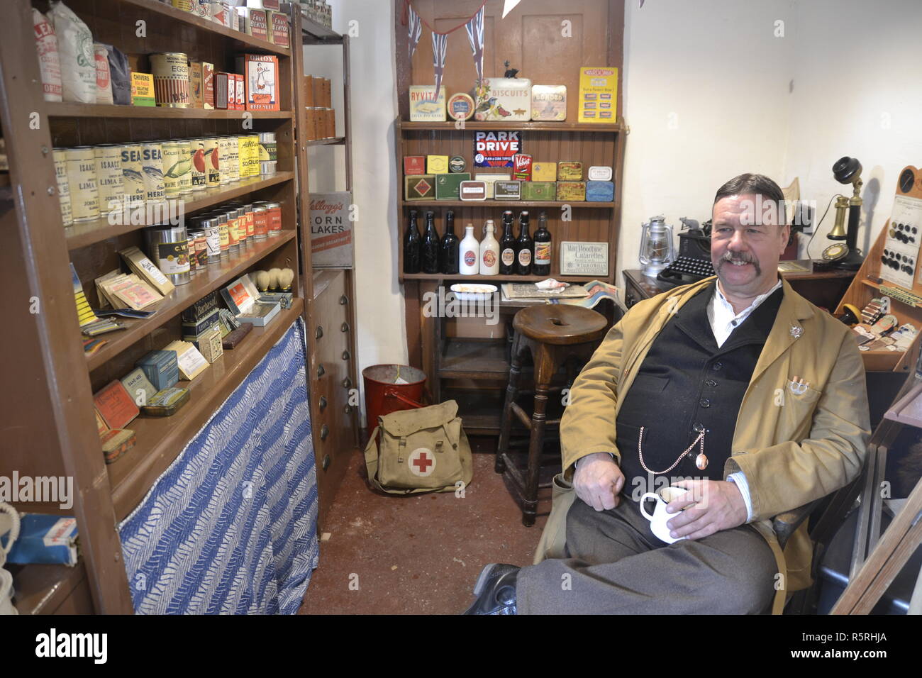 Shop keeper assistant hi-res stock photography and images - Alamy