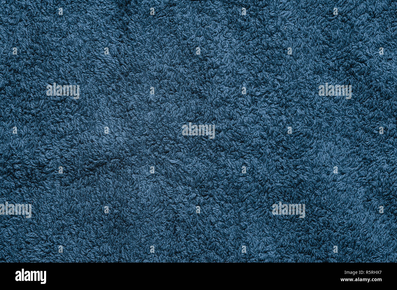 The texture of the fabric with a long nap. Blue textile blank ...