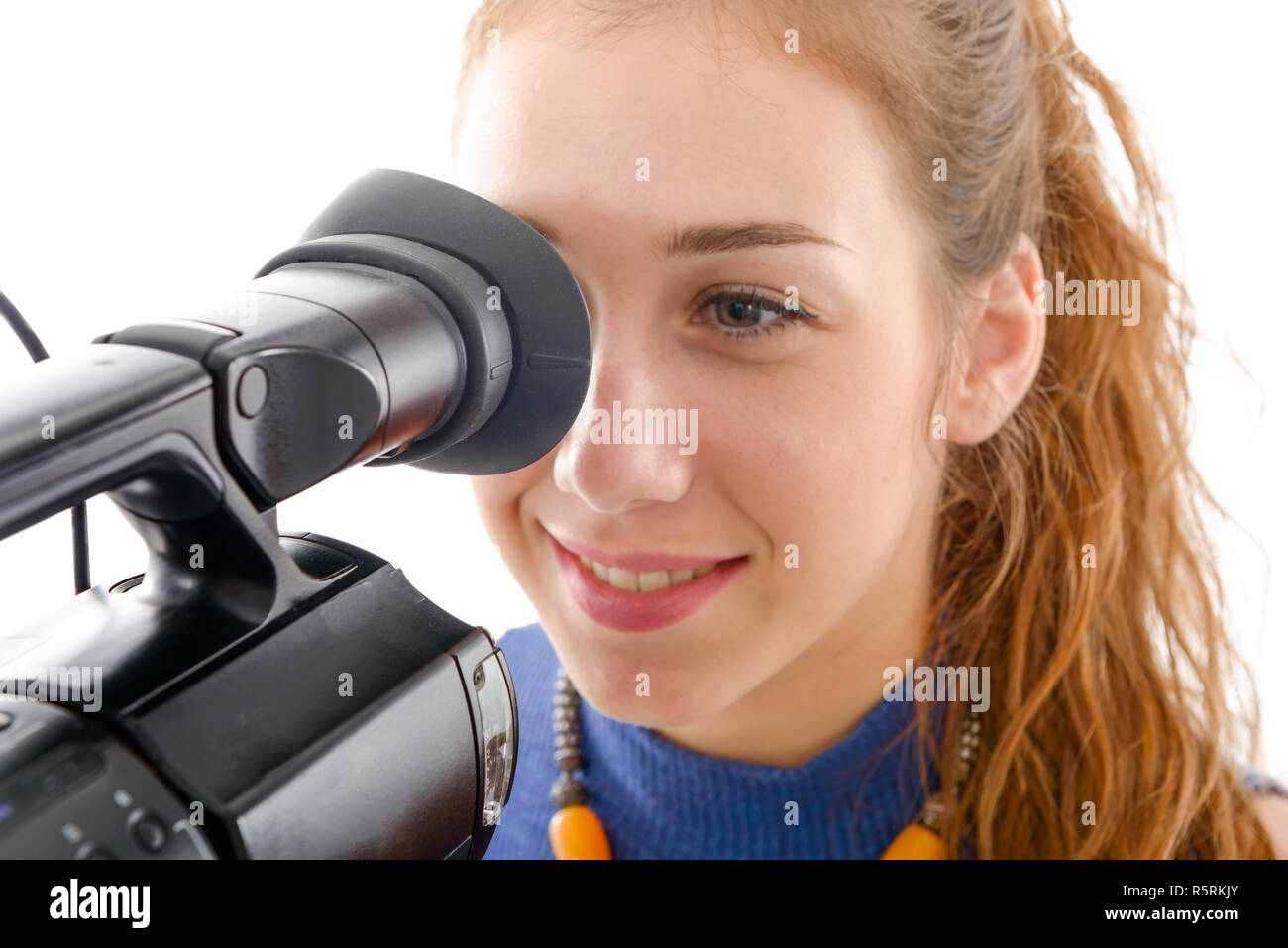 young woman with a video camera, on white background Stock Photo - Alamy