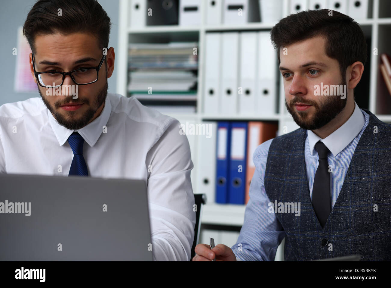 Group of people in office use laptop pc portrait Stock Photo - Alamy