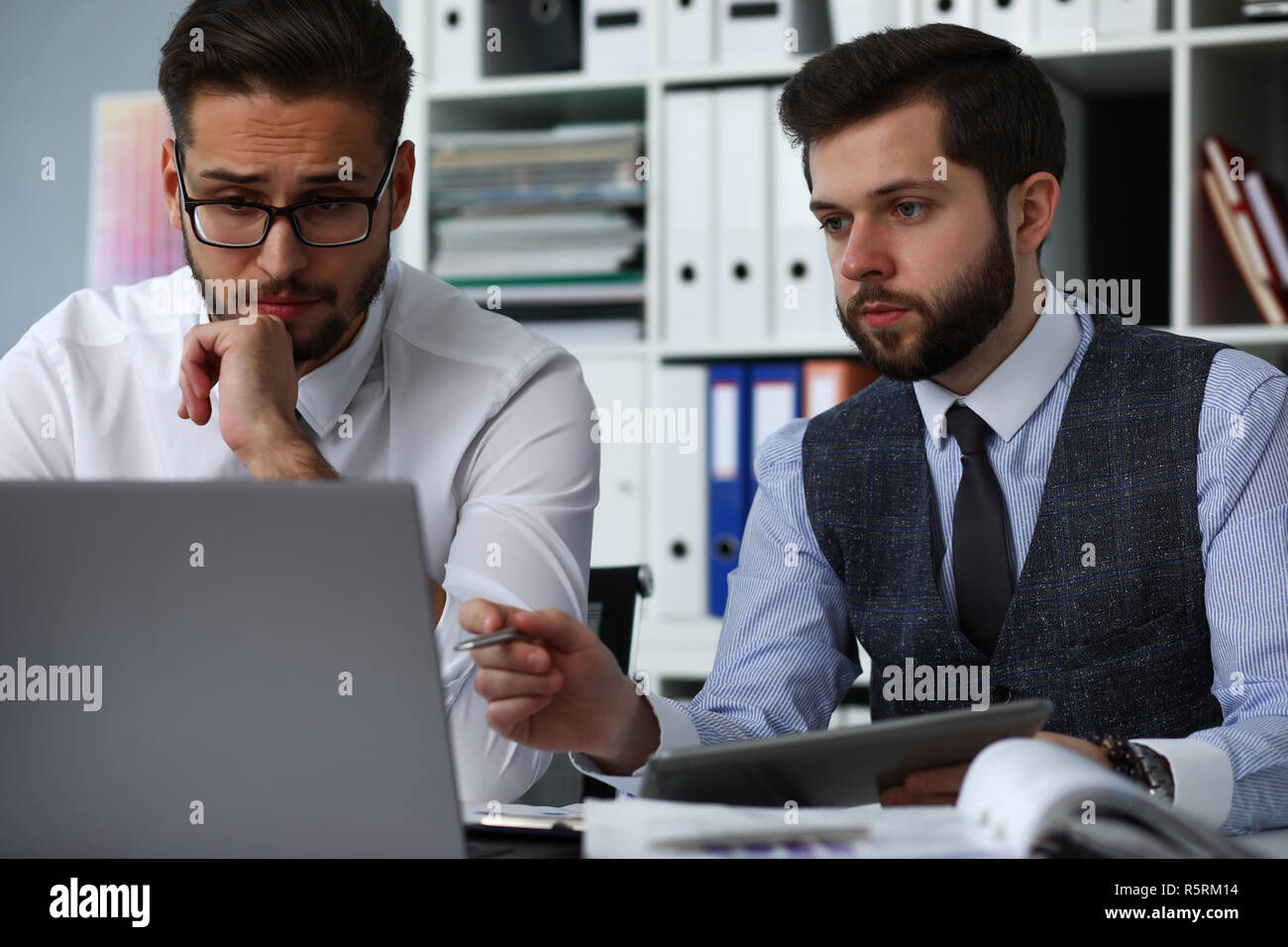 Group of people in office use laptop pc portrait Stock Photo - Alamy