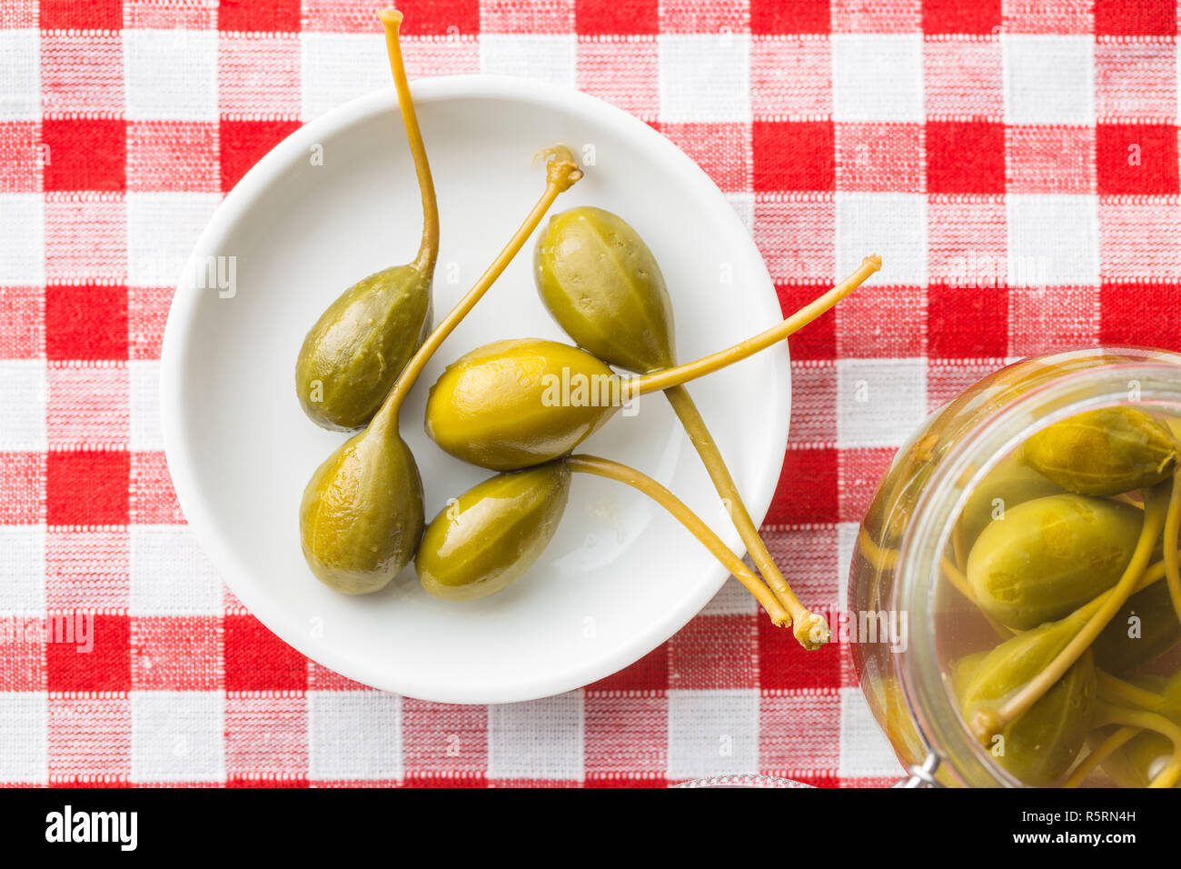 Pickled caper berries Stock Photo - Alamy