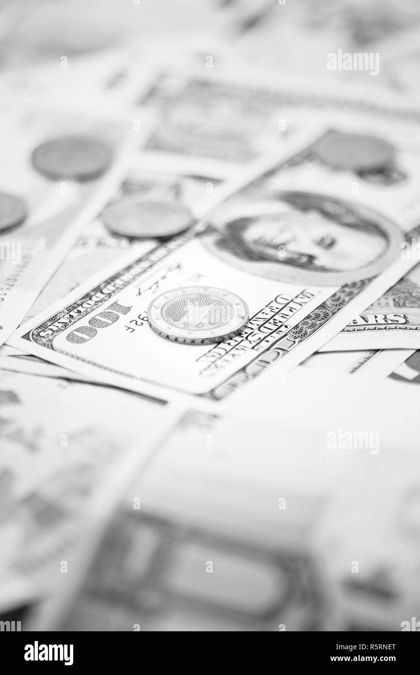 blurred dollar euro and coins money background like concept of ...