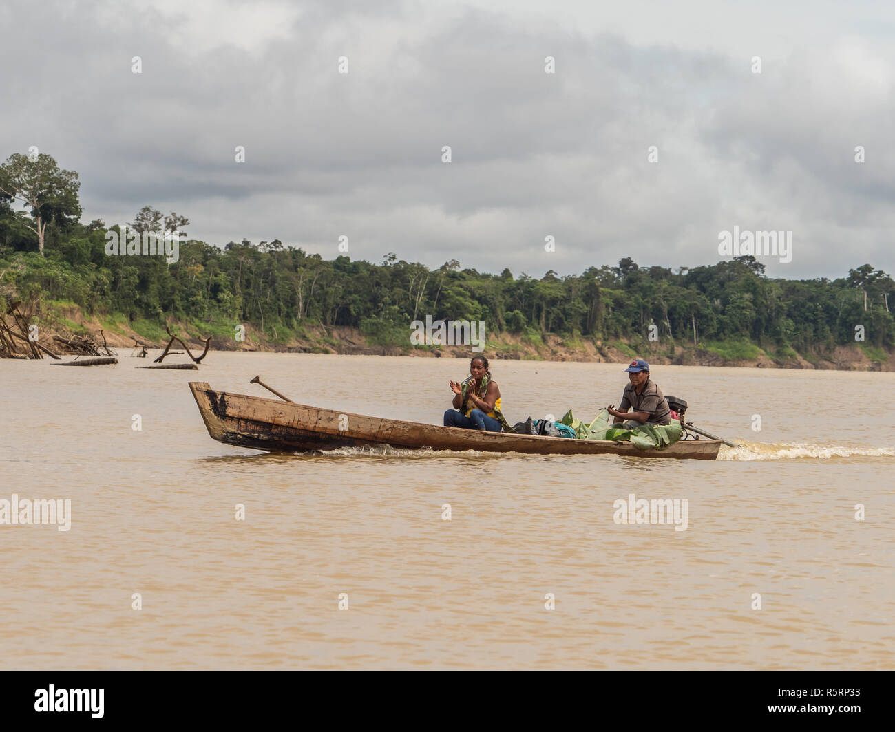 Amazon River, Brazil: - Sep 15, 2018: Small boat with locals on the ...