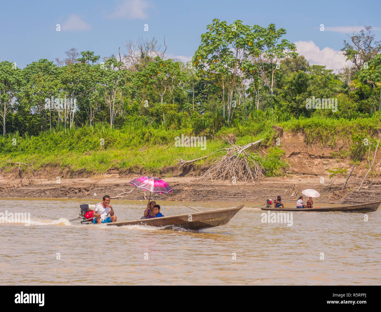 Amazon River, Brazil: - Sep 15, 2018: Small boat with locals on the ...