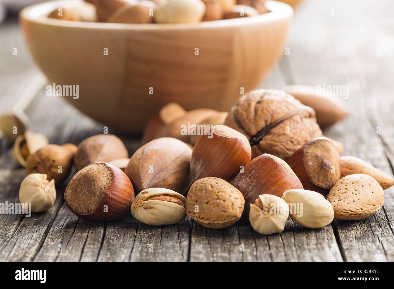 Different types of nuts in the nutshell Stock Photo - Alamy