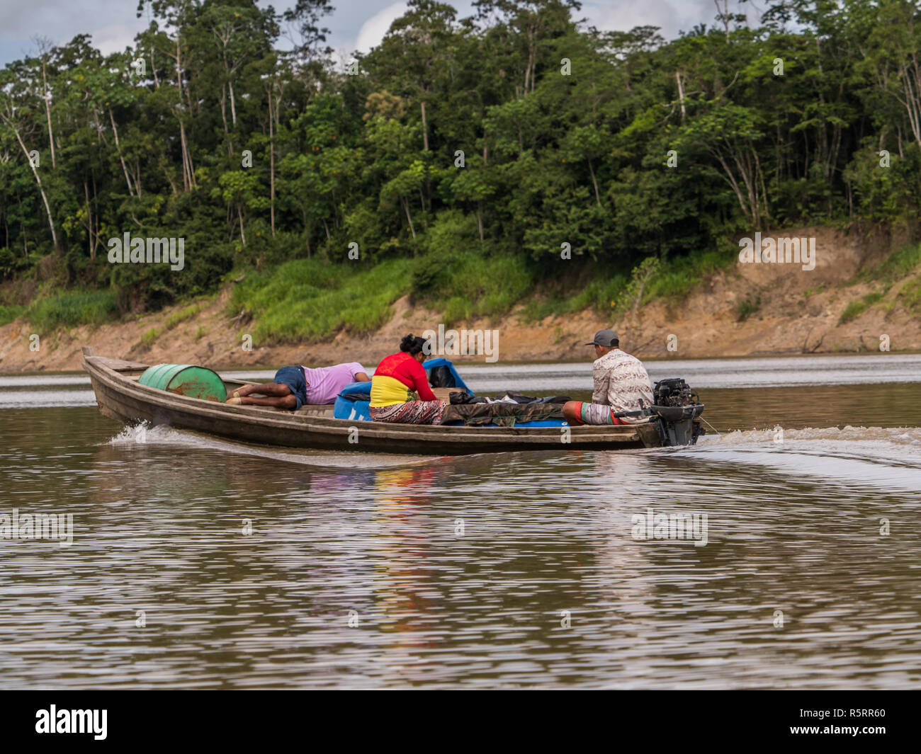Amazon River, Brazil: - Sep 15, 2018: Small boat with locals on the ...