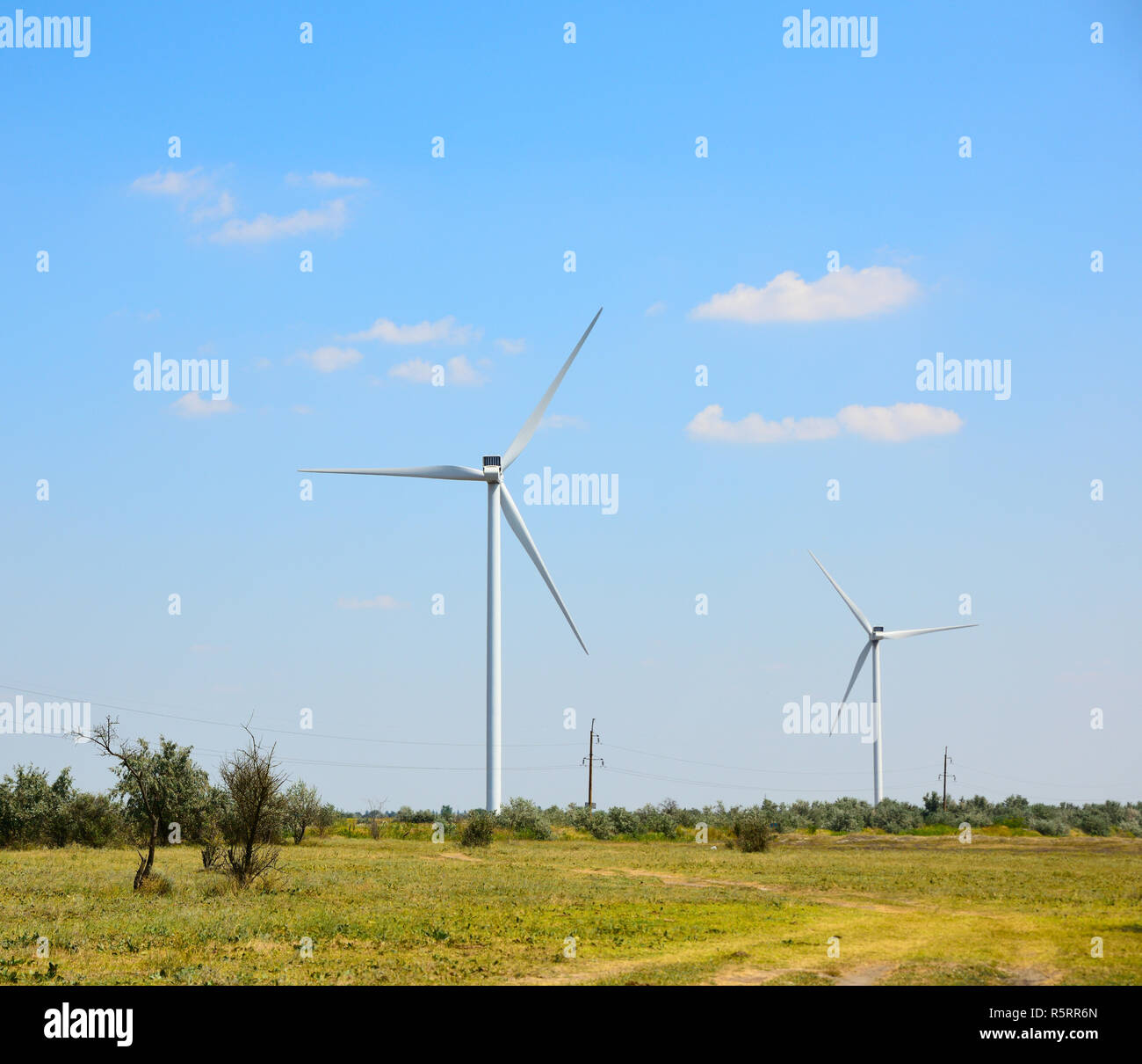 windmills in the field Stock Photo - Alamy