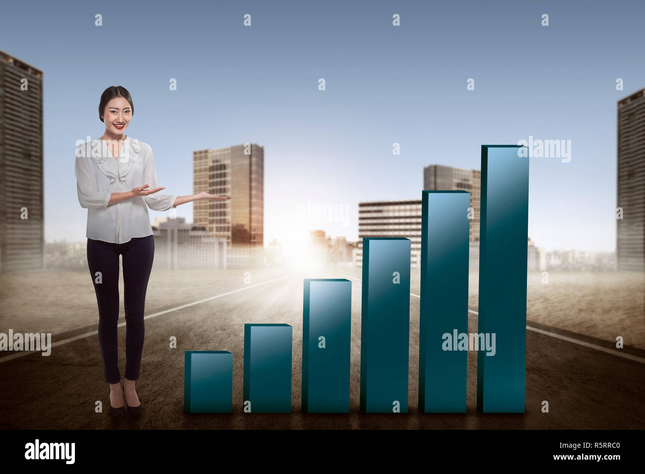 Asian business woman show increase chart Stock Photo - Alamy