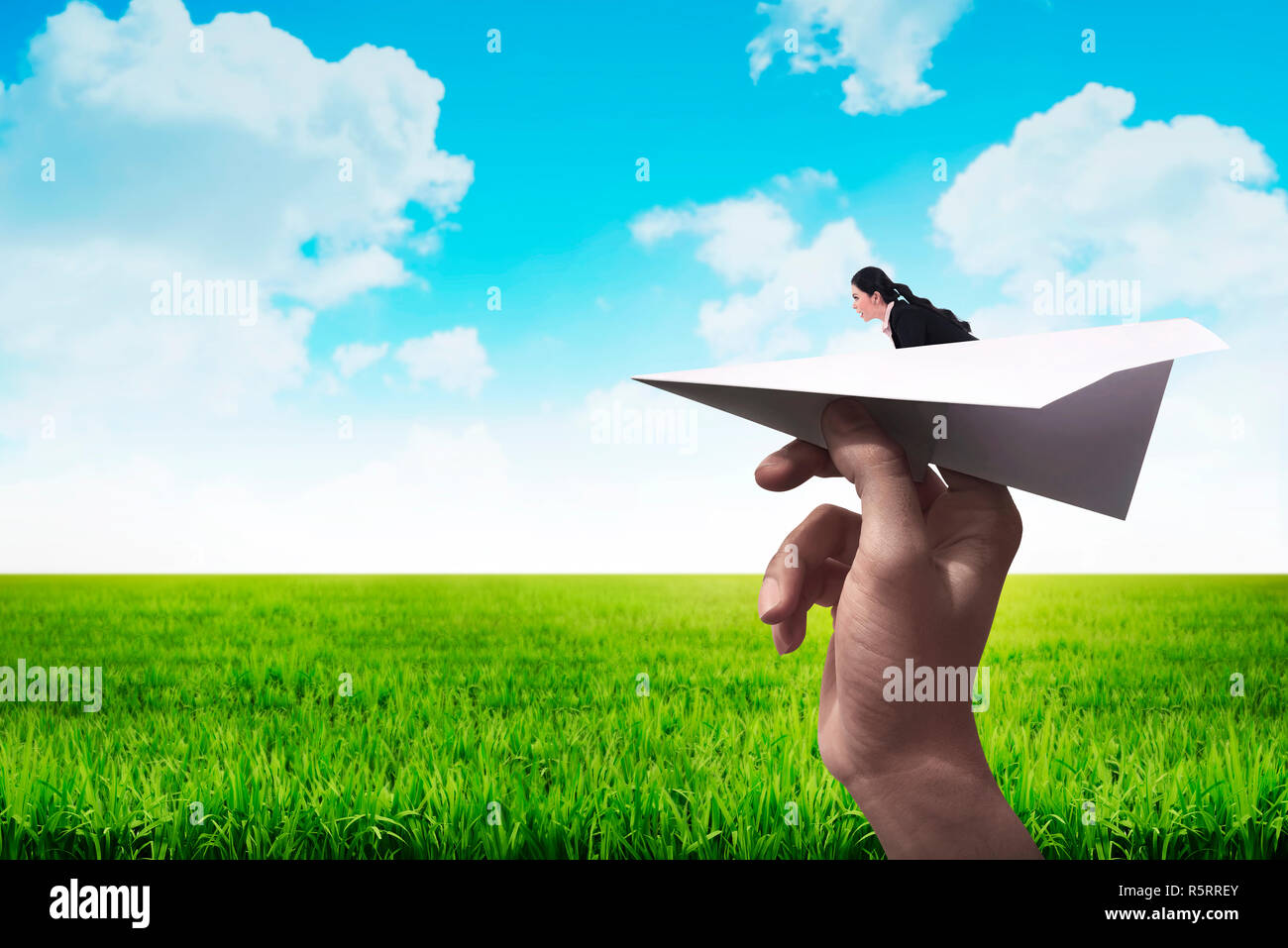 Business woman ready to launch with paper plane Stock Photo - Alamy