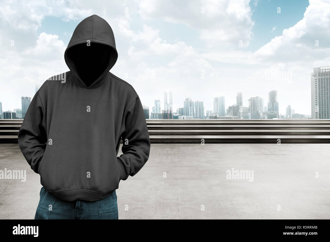 Faceless man in hood Stock Photo - Alamy