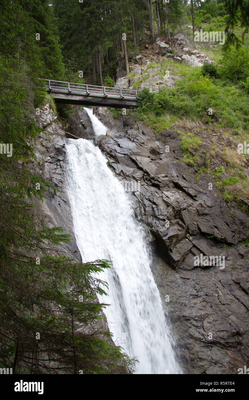 wooden bridge over waterfall in a forest in styria at day Stock Photo ...