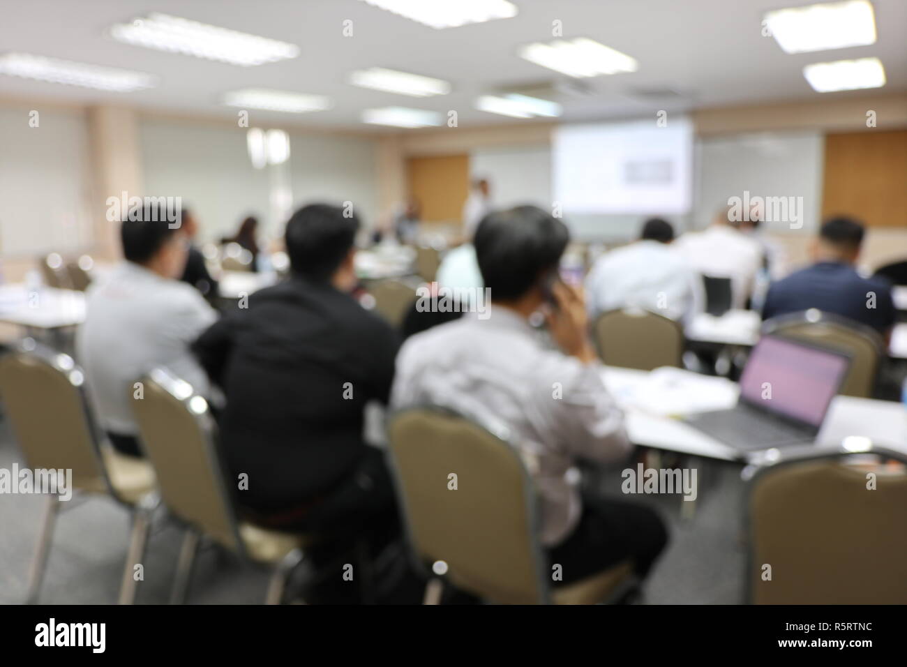 Blurred training room ; presentation event ; education Stock Photo - Alamy