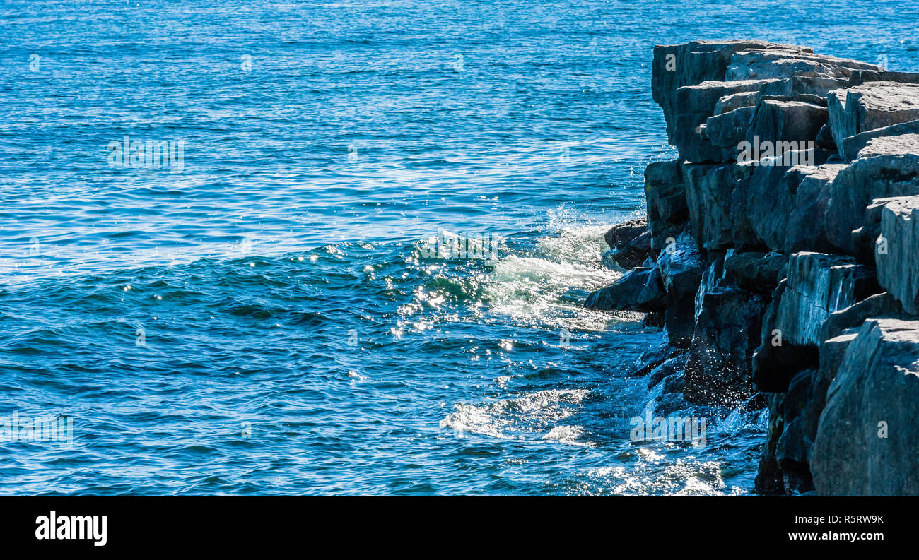 Splashing against breakwater hi-res stock photography and images - Alamy