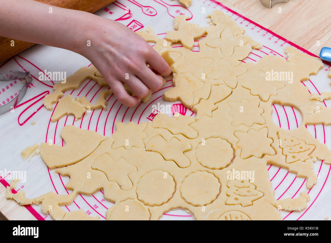 Girl hands cutting heart hi-res stock photography and images - Alamy
