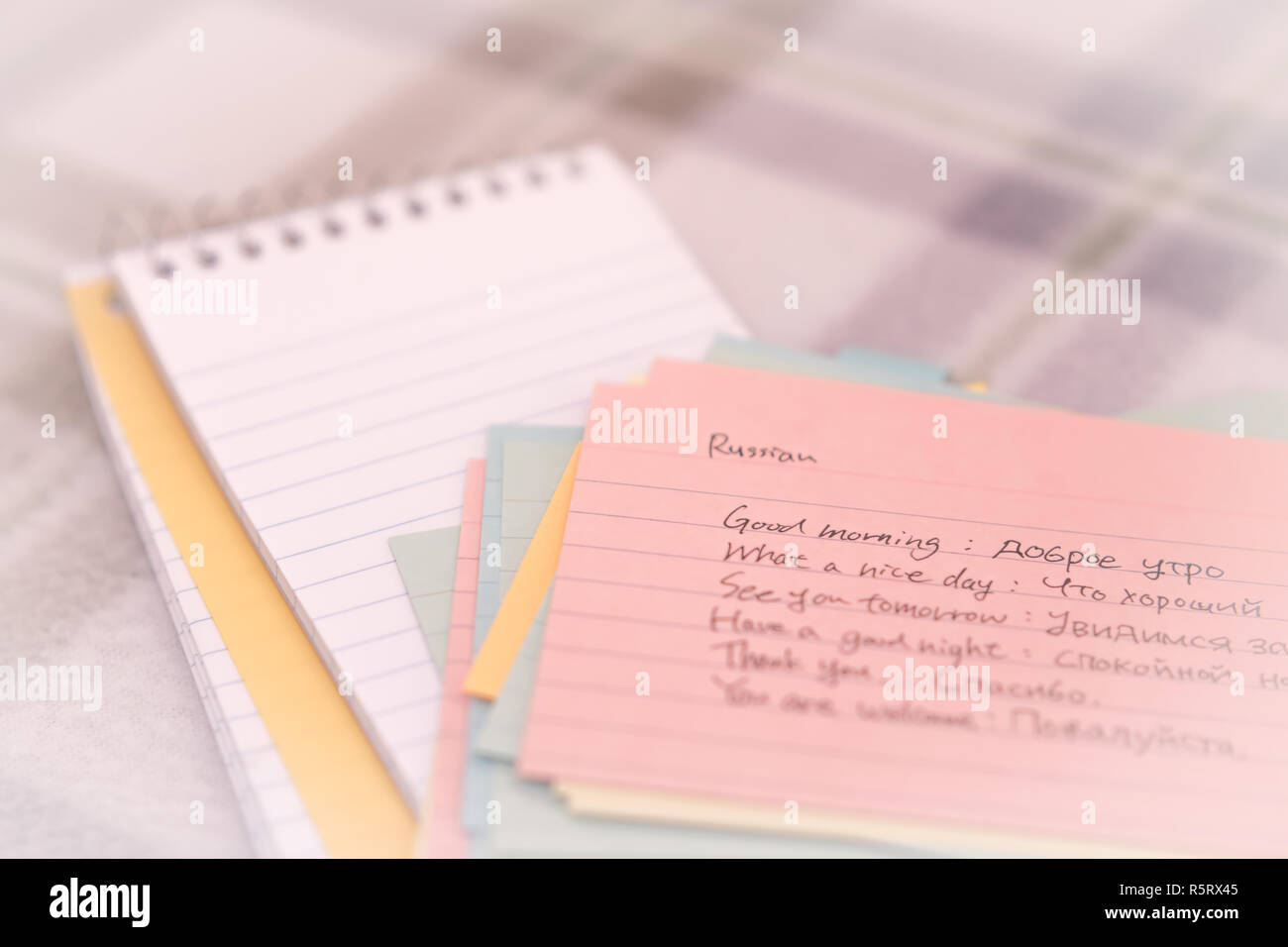 Russian Learning New Language Writing Greetings on the Notebook Stock ...