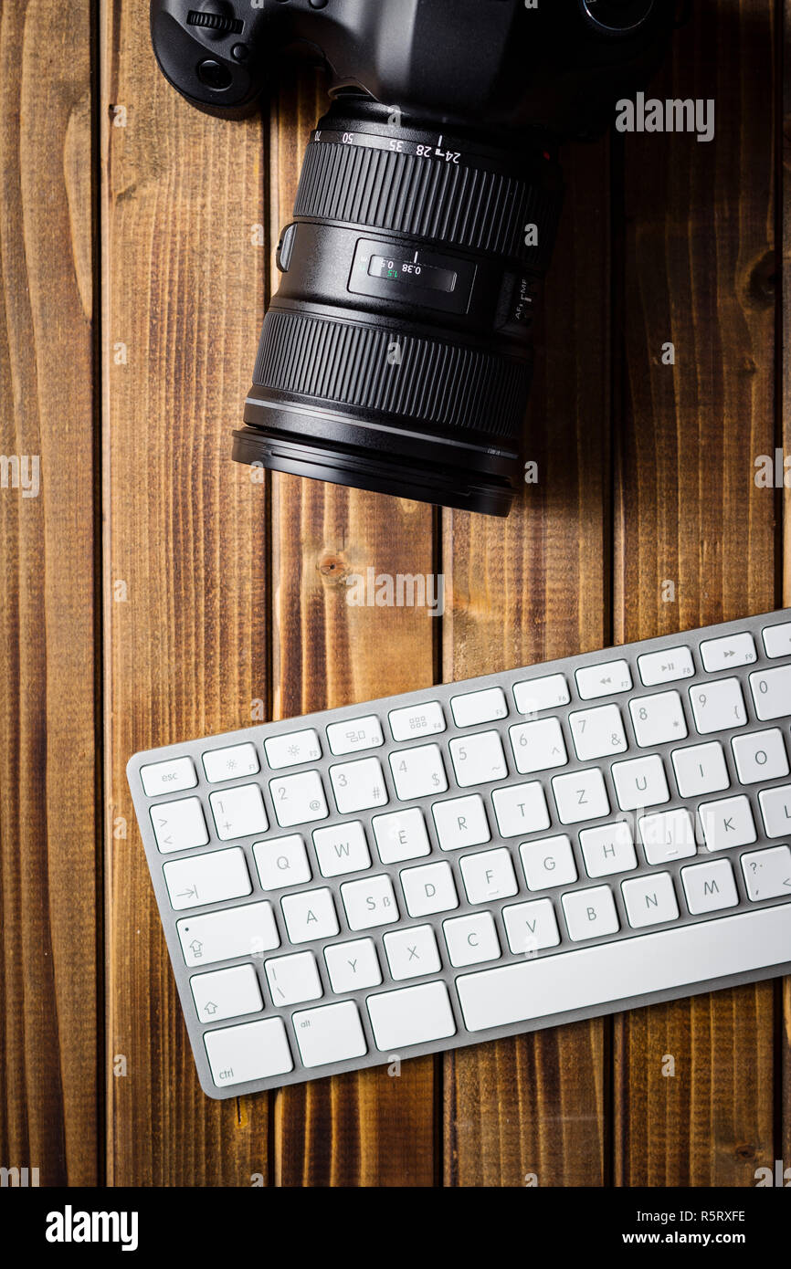 Professional digital camera and computer keyboard Stock Photo - Alamy