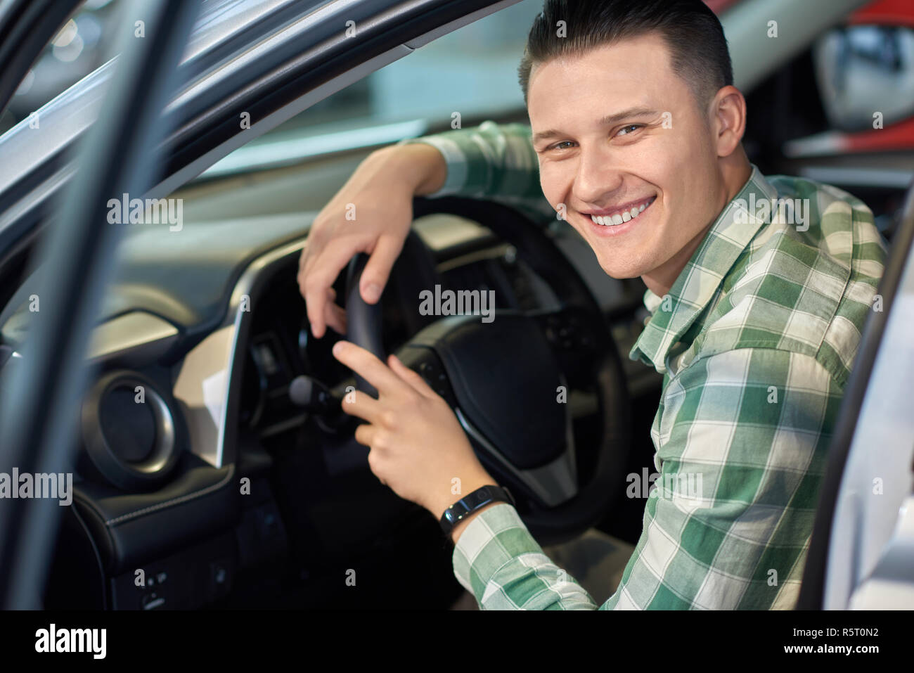 New car owner hi-res stock photography and images - Alamy