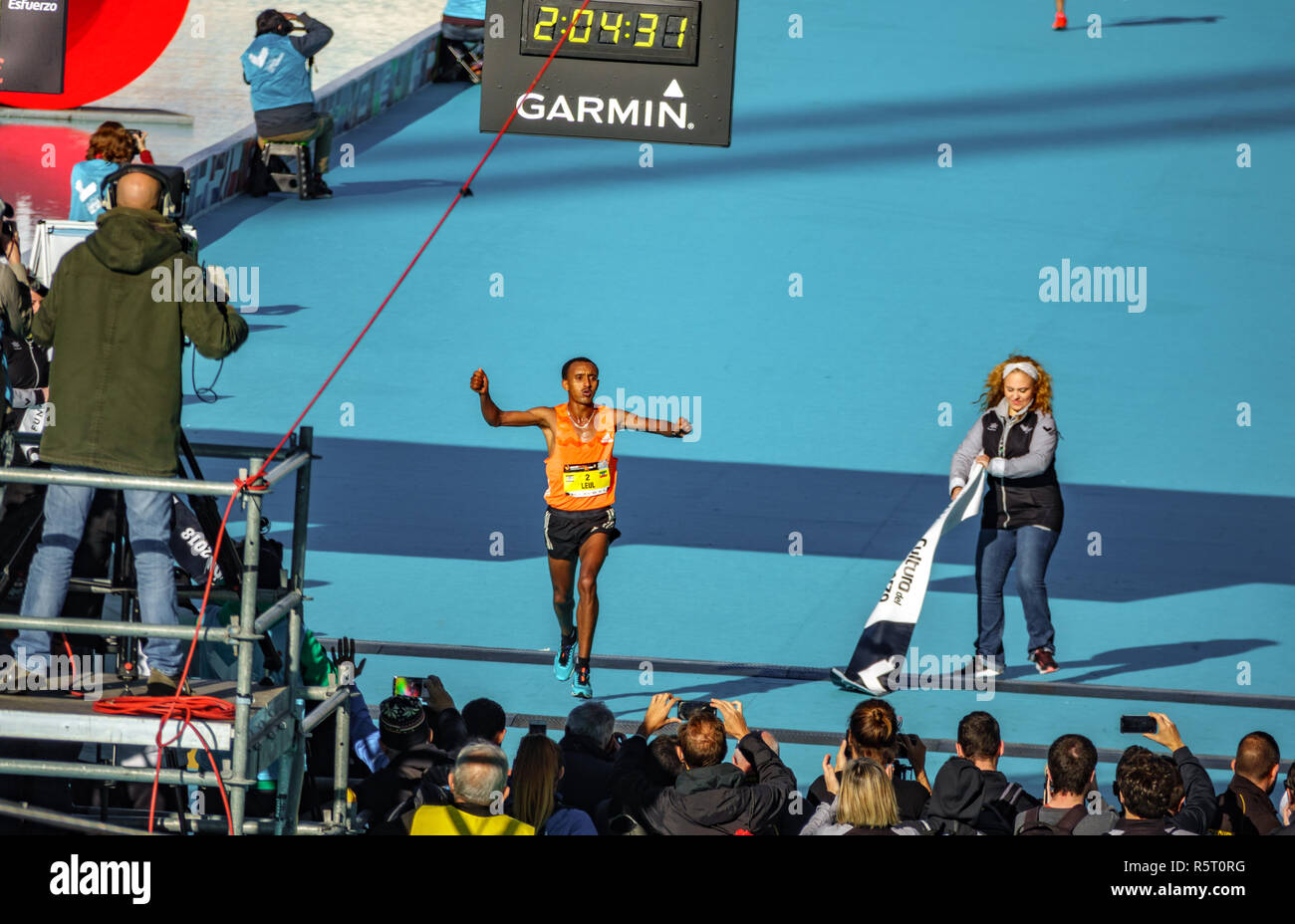 Finalizing Marathon race and breaking event record Stock Photo - Alamy