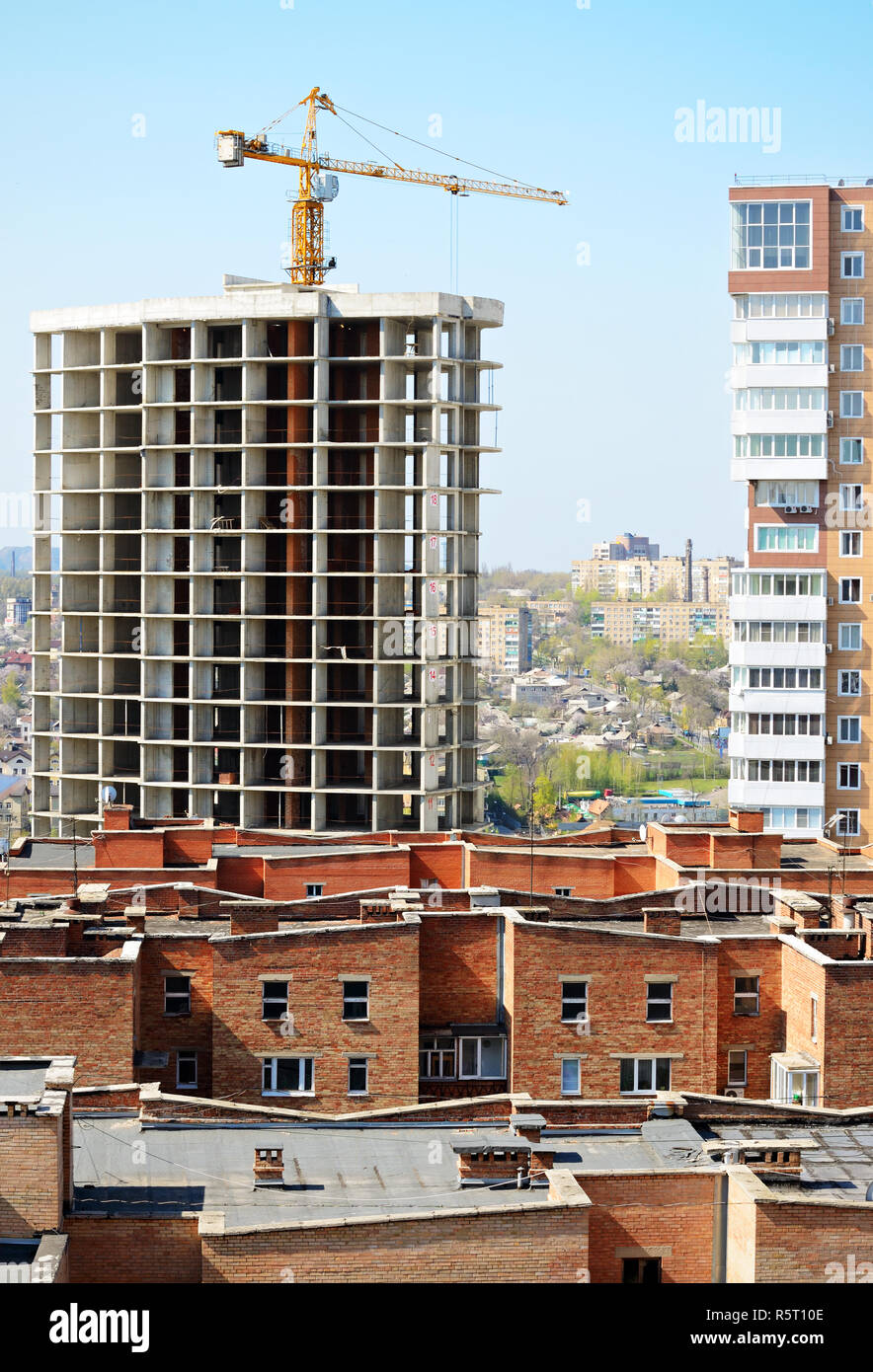 Construction of a new building in the city Stock Photo - Alamy