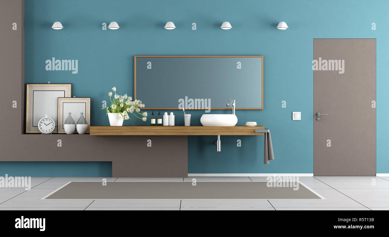 Blue and brown modern bathroom Stock Photo - Alamy