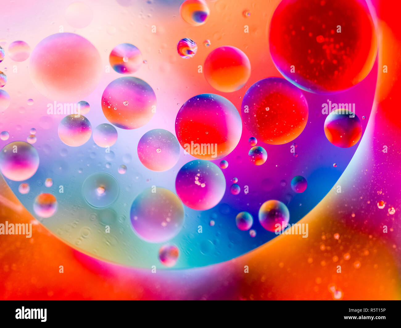 rainbow oil and water Stock Photo - Alamy