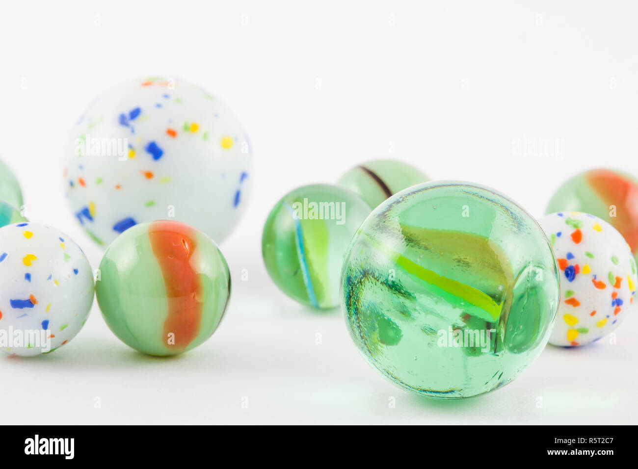 Glass marble balls isolated on white background Stock Photo - Alamy