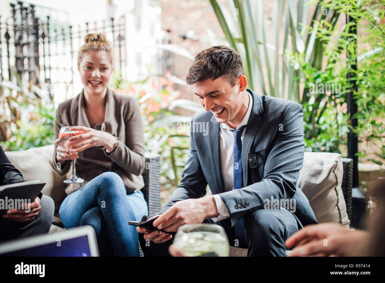 Business People Socialising After Work Stock Photo - Alamy