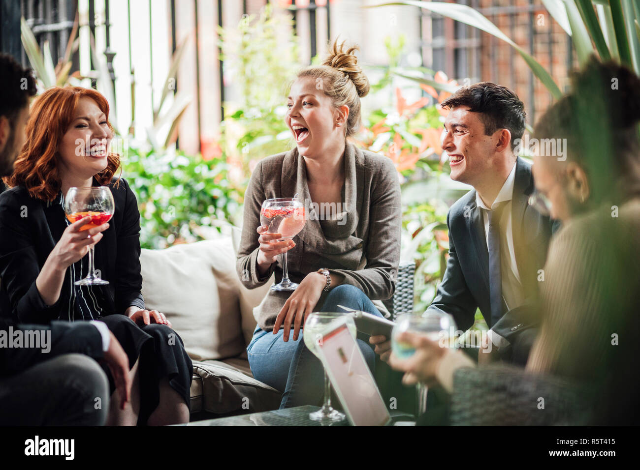 Business People Drinking After Work Stock Photo - Alamy