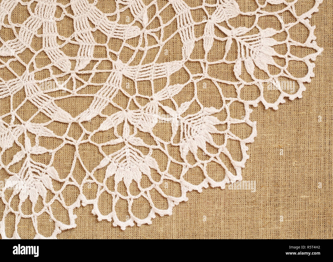 Crochet lace oncanvas background Stock Photo - Alamy