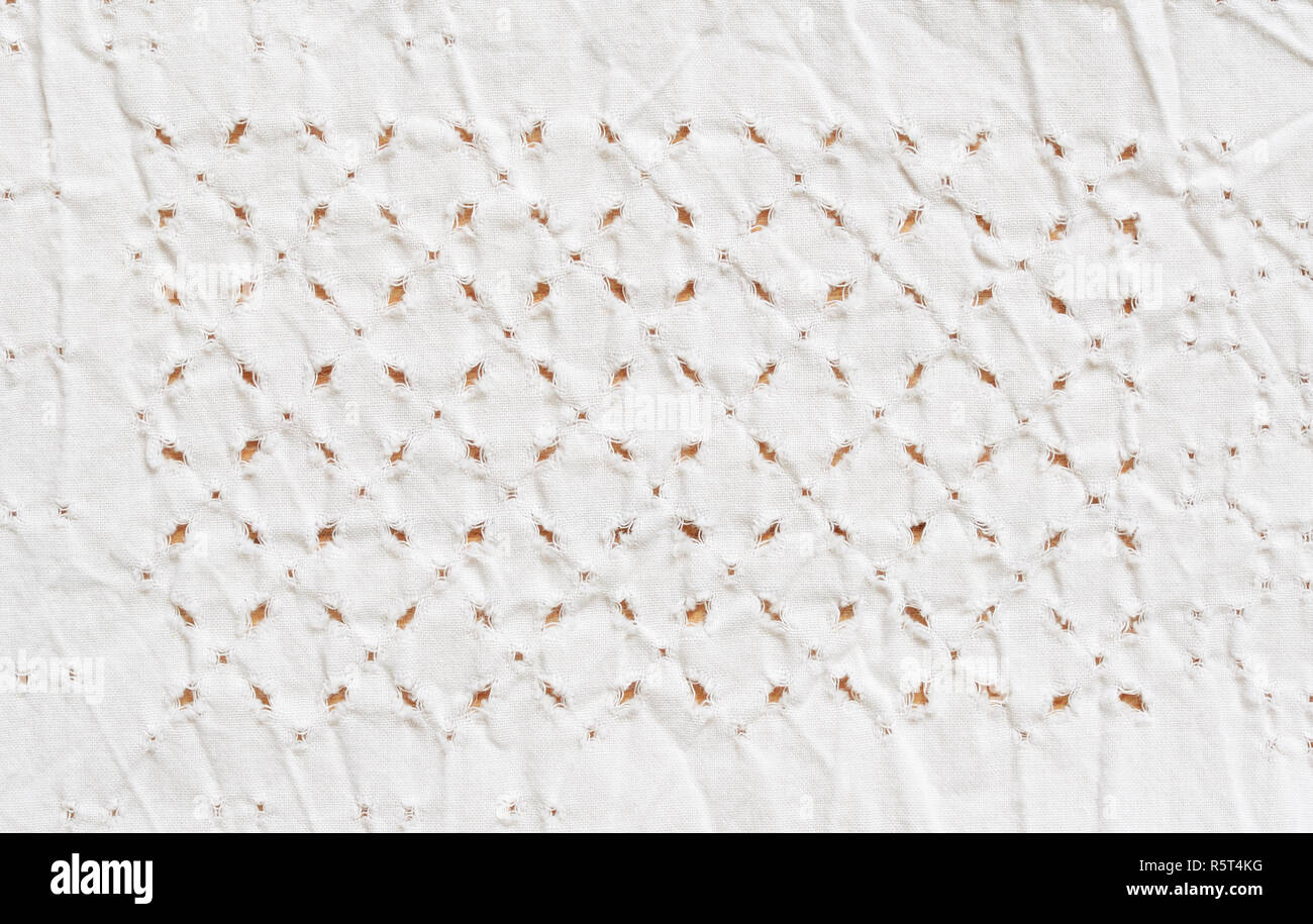 Background from white fabric with cuts Stock Photo - Alamy