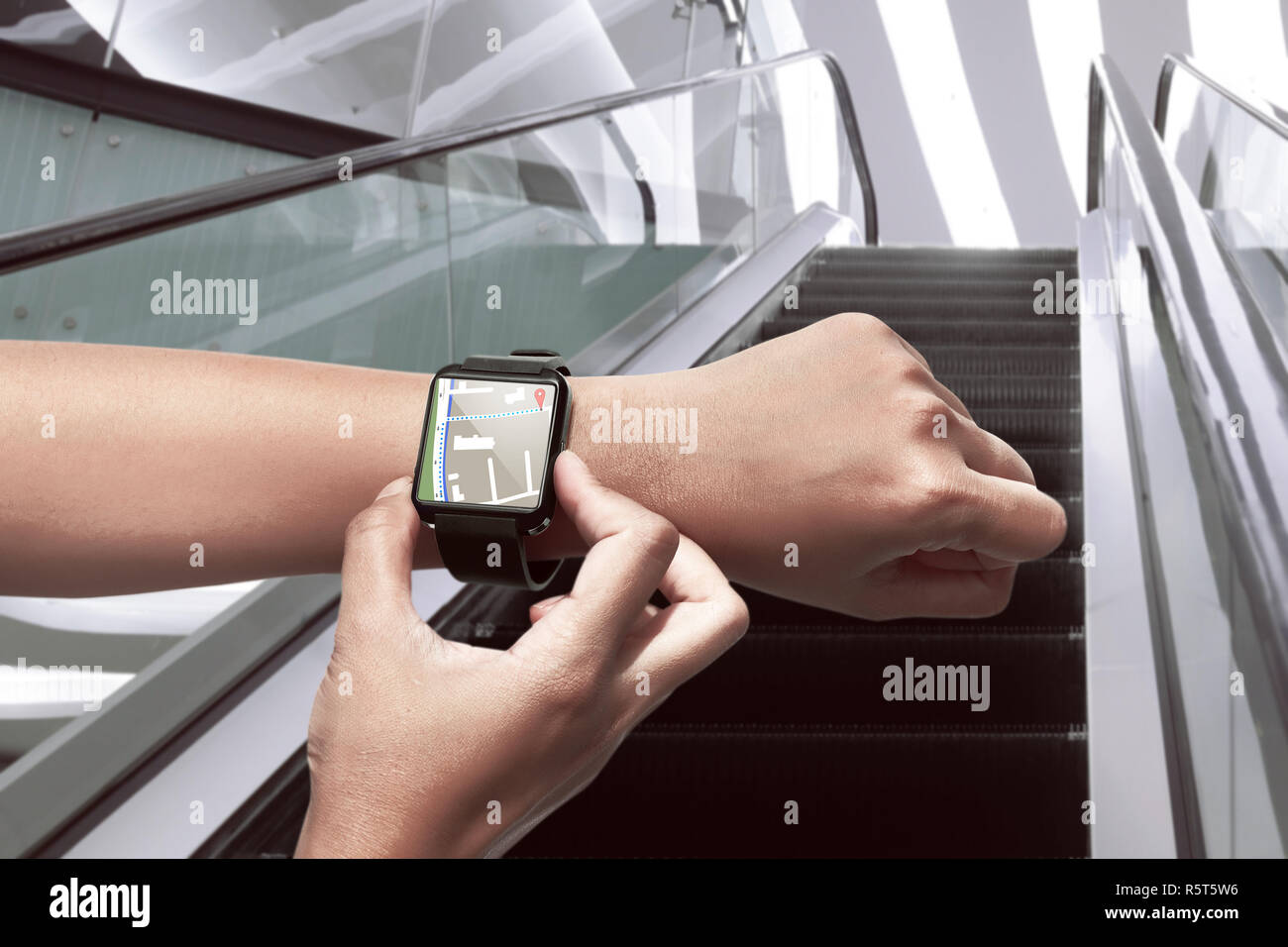 Hand setting route for GPS on the smart watch Stock Photo - Alamy