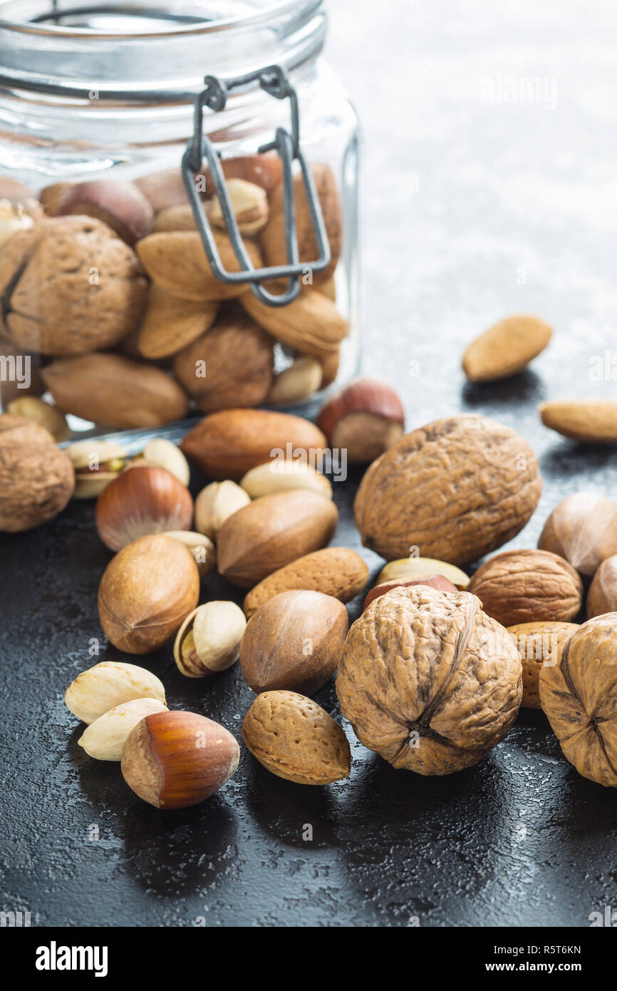 Different types of nuts in the nutshell Stock Photo - Alamy