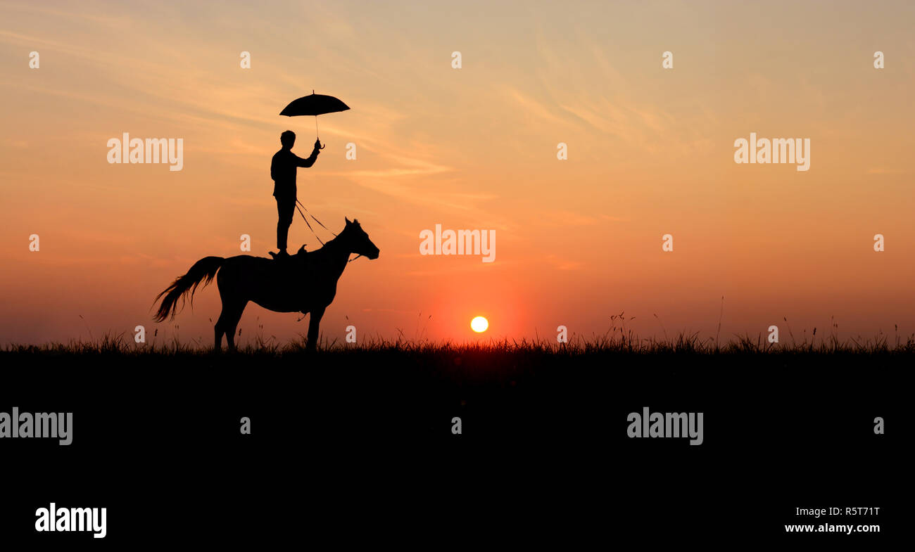 Two men silhouette horse hi-res stock photography and images - Alamy