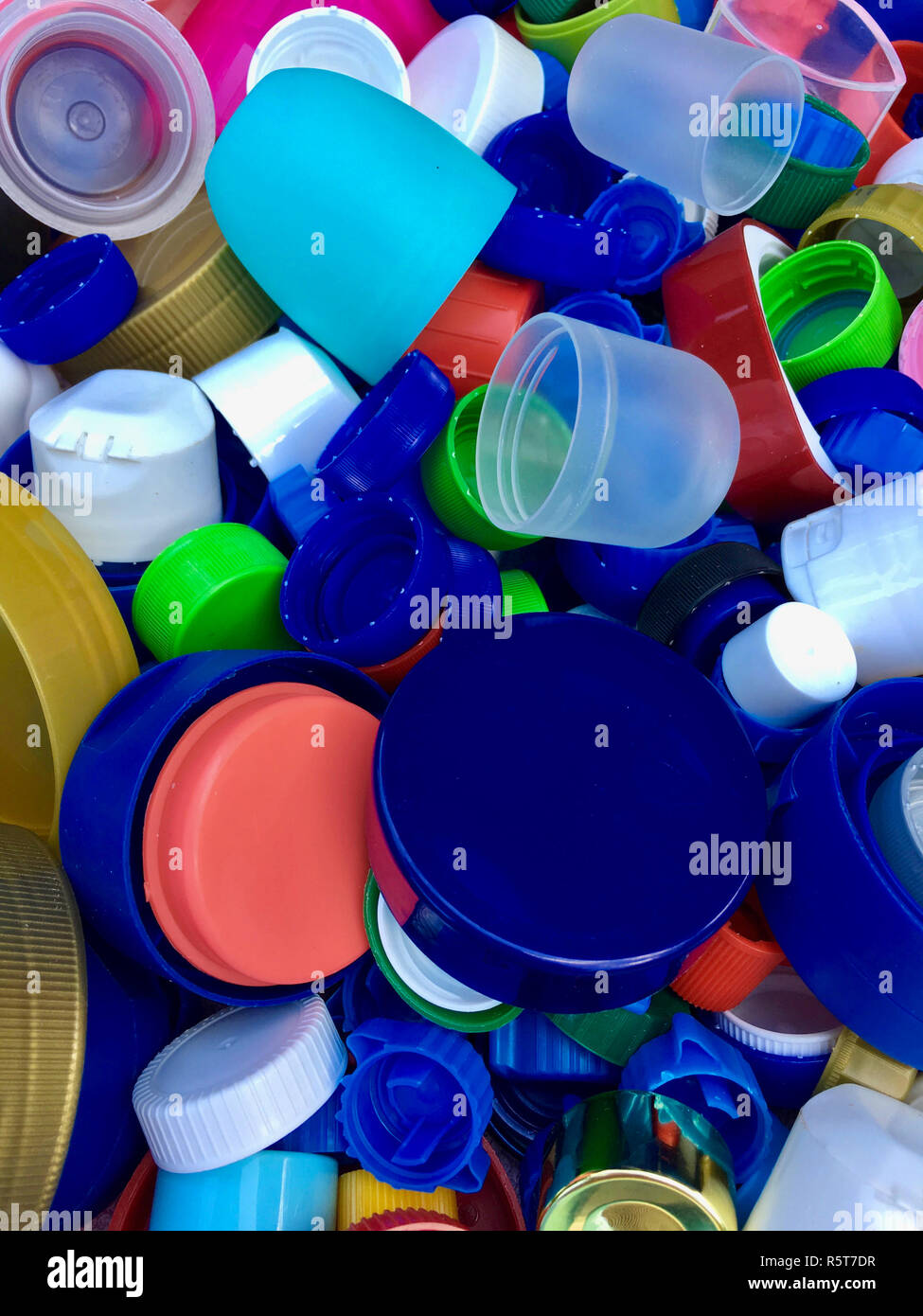 used plastic lids,recycled material Stock Photo - Alamy