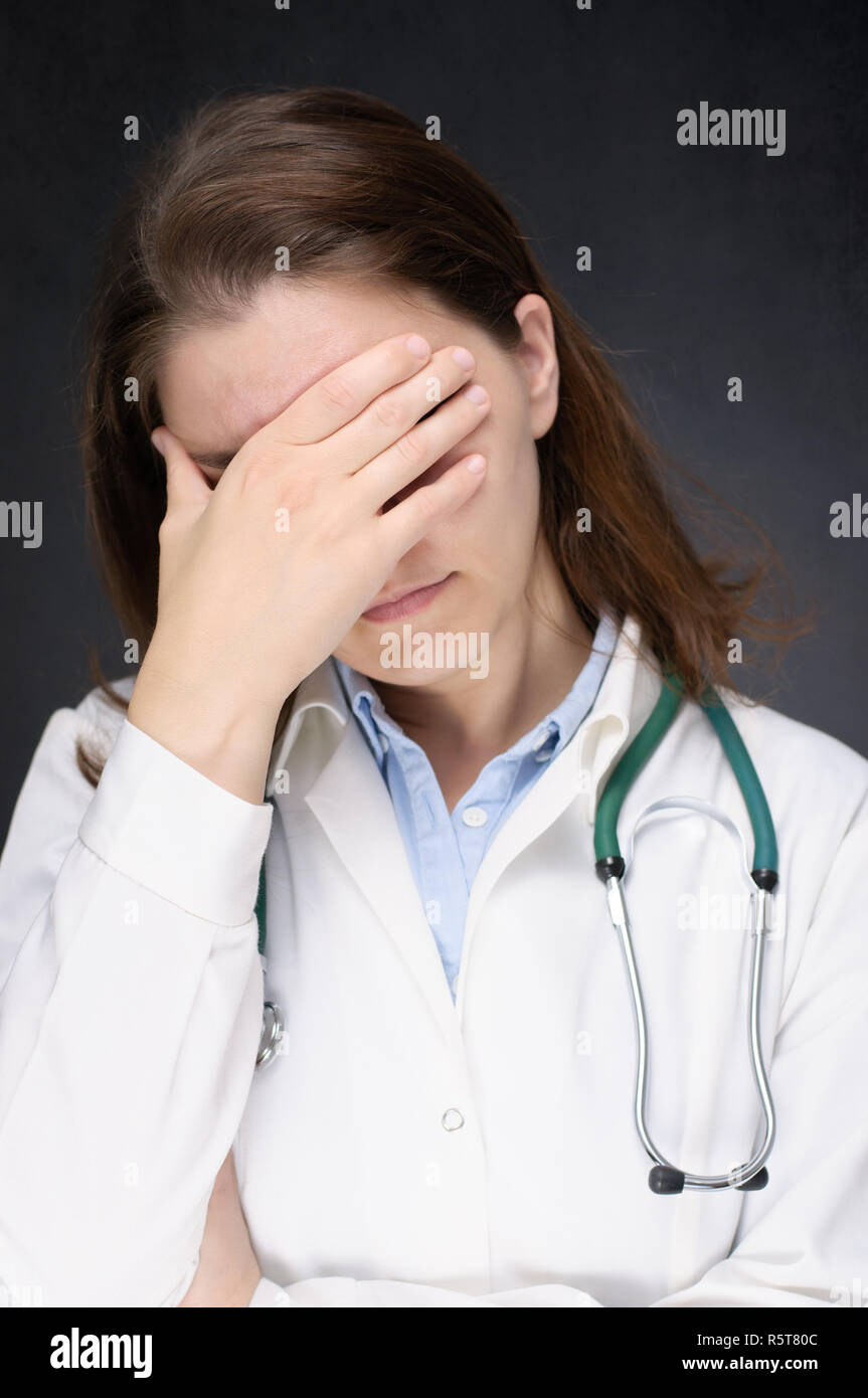 Tired stressed healthcare worker hi-res stock photography and images ...