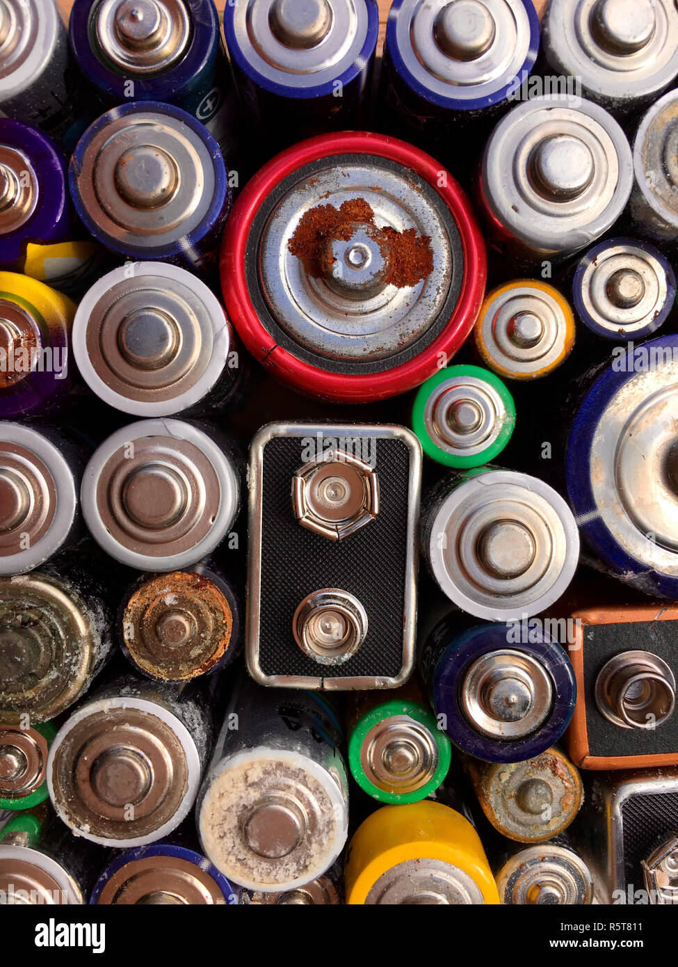 old and used batteries Stock Photo - Alamy
