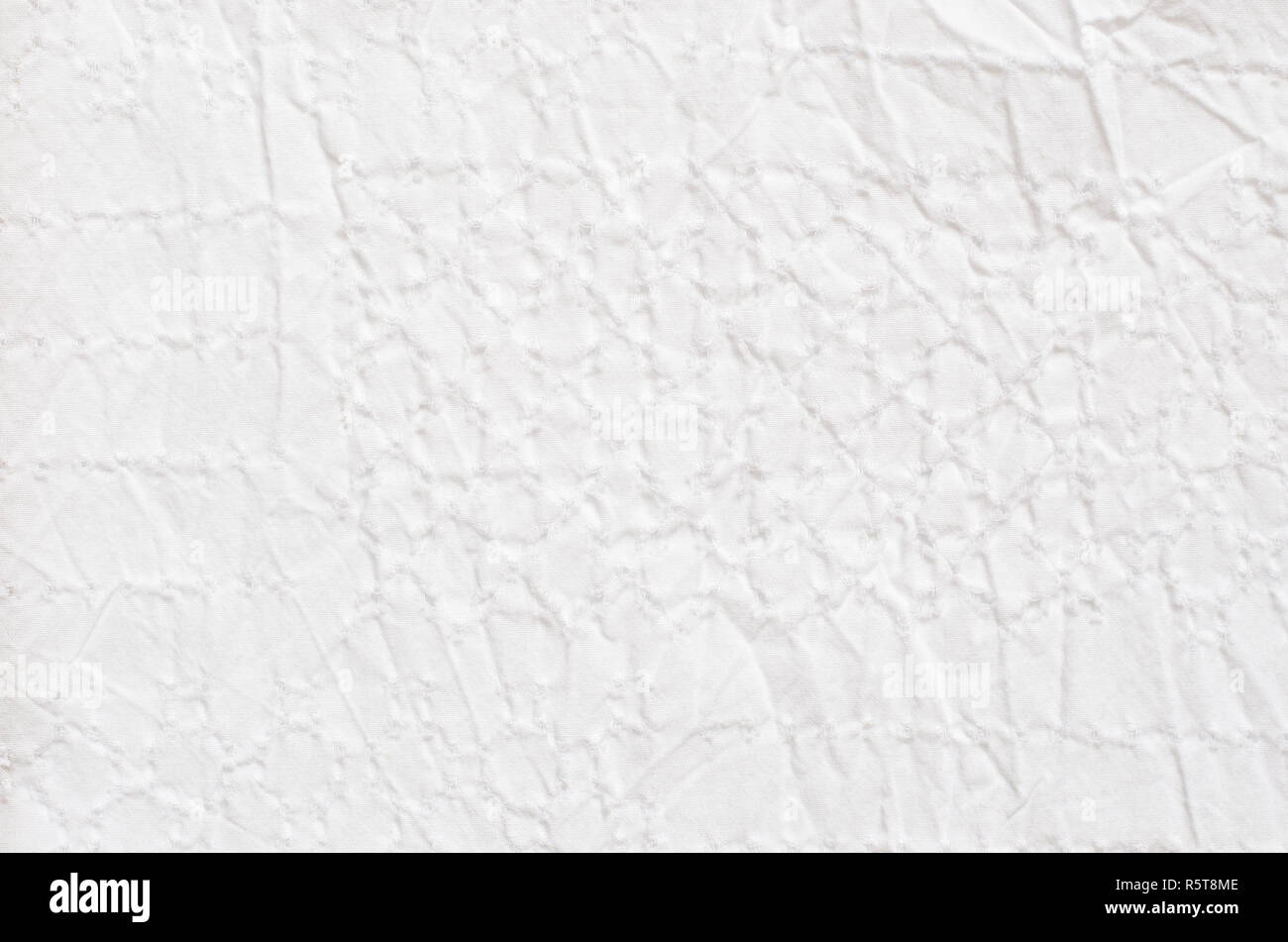 White fabric with cuts for background Stock Photo - Alamy