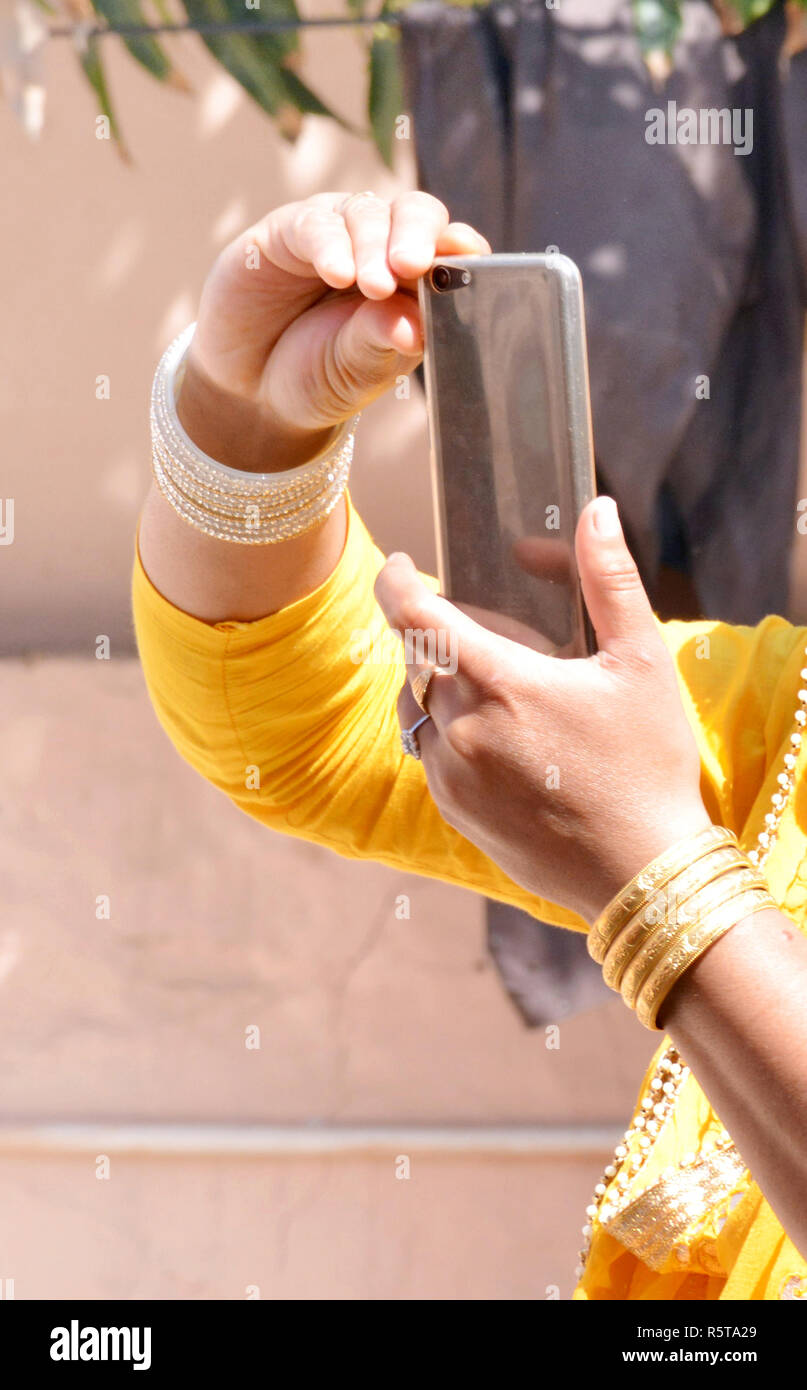 Woman Hands taking a photo Stock Photo - Alamy