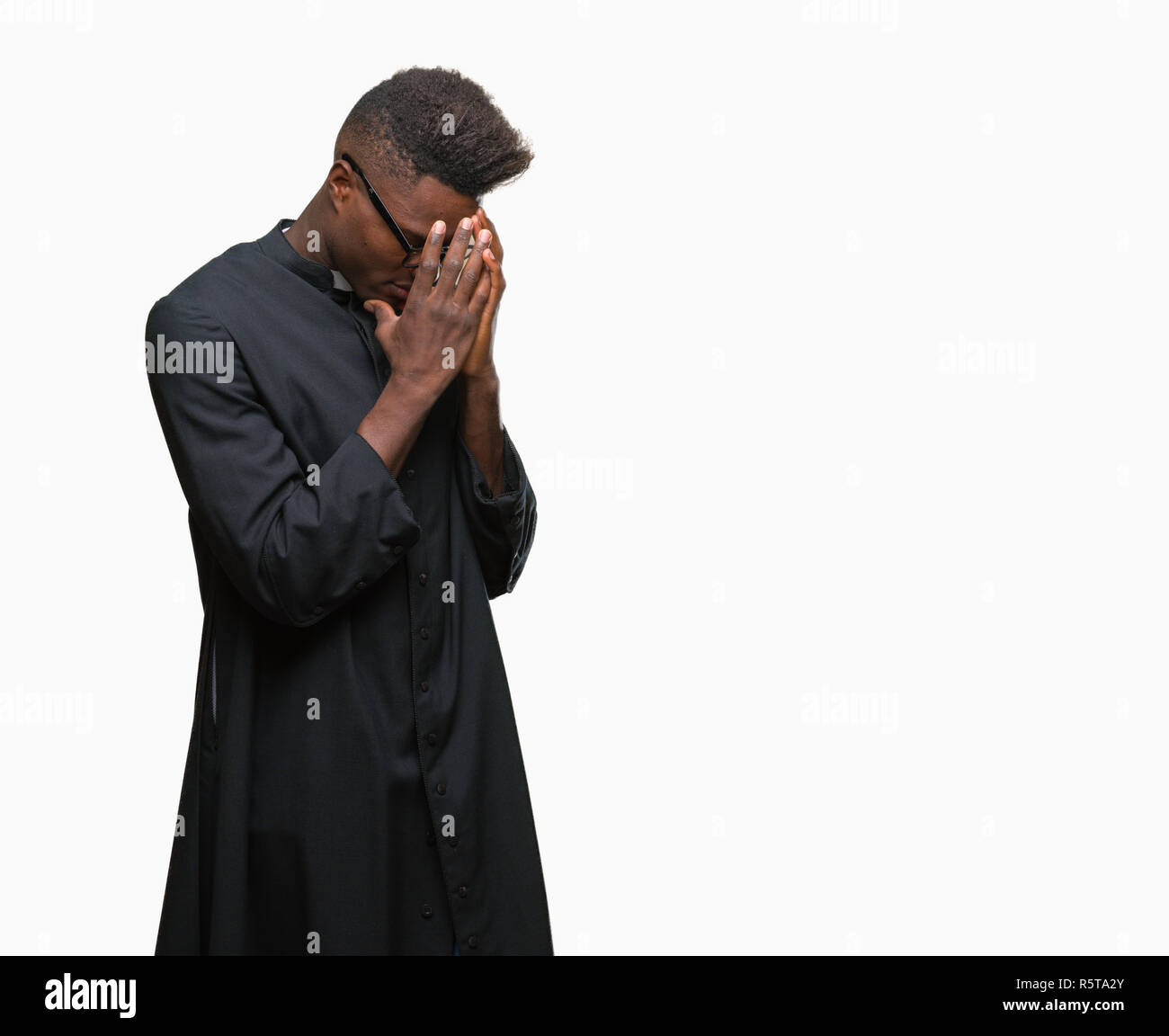 Young african american priest man over isolated background with sad ...