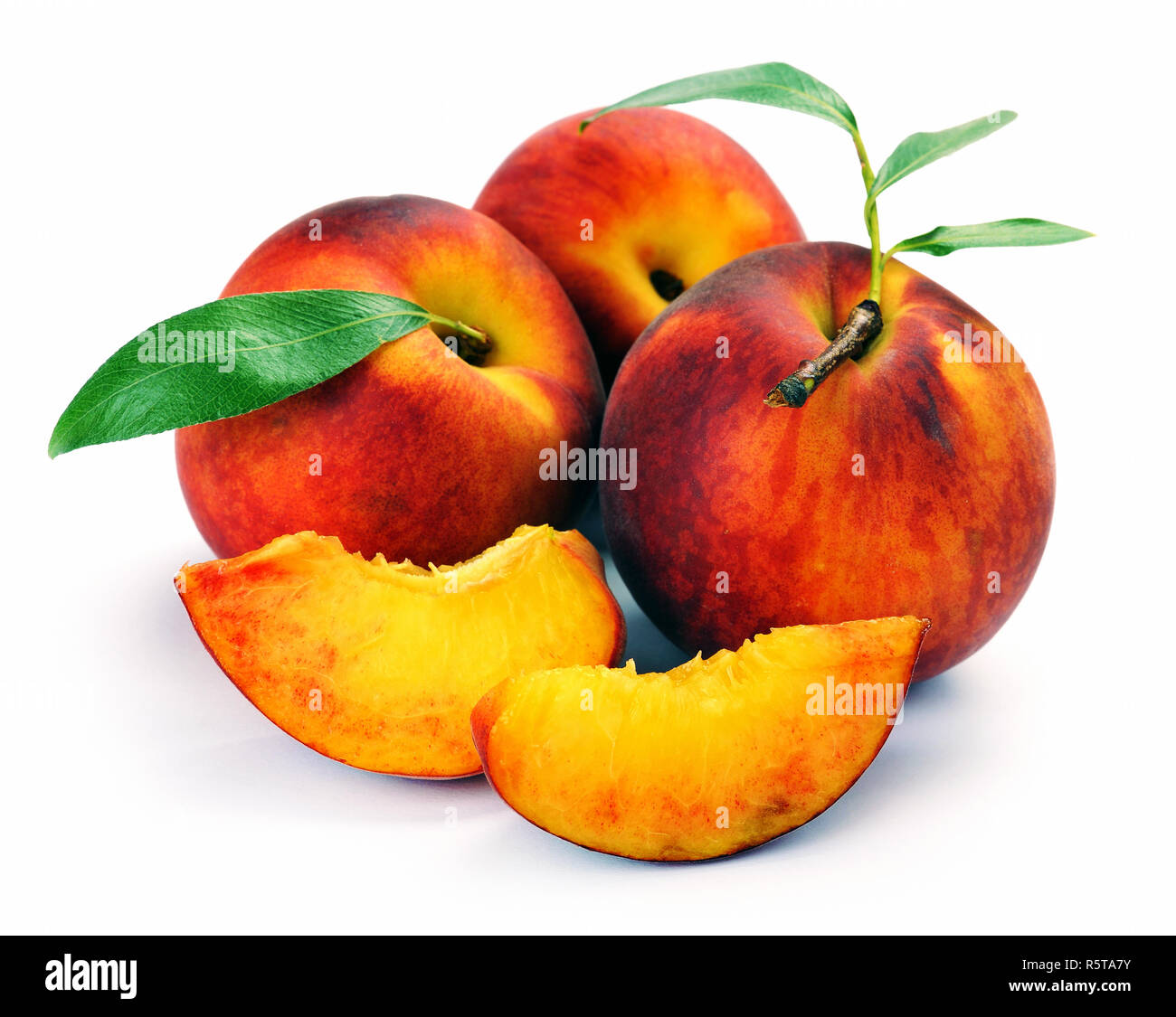 Fresh peach with green leaf isolated on white background. Peach in a ...