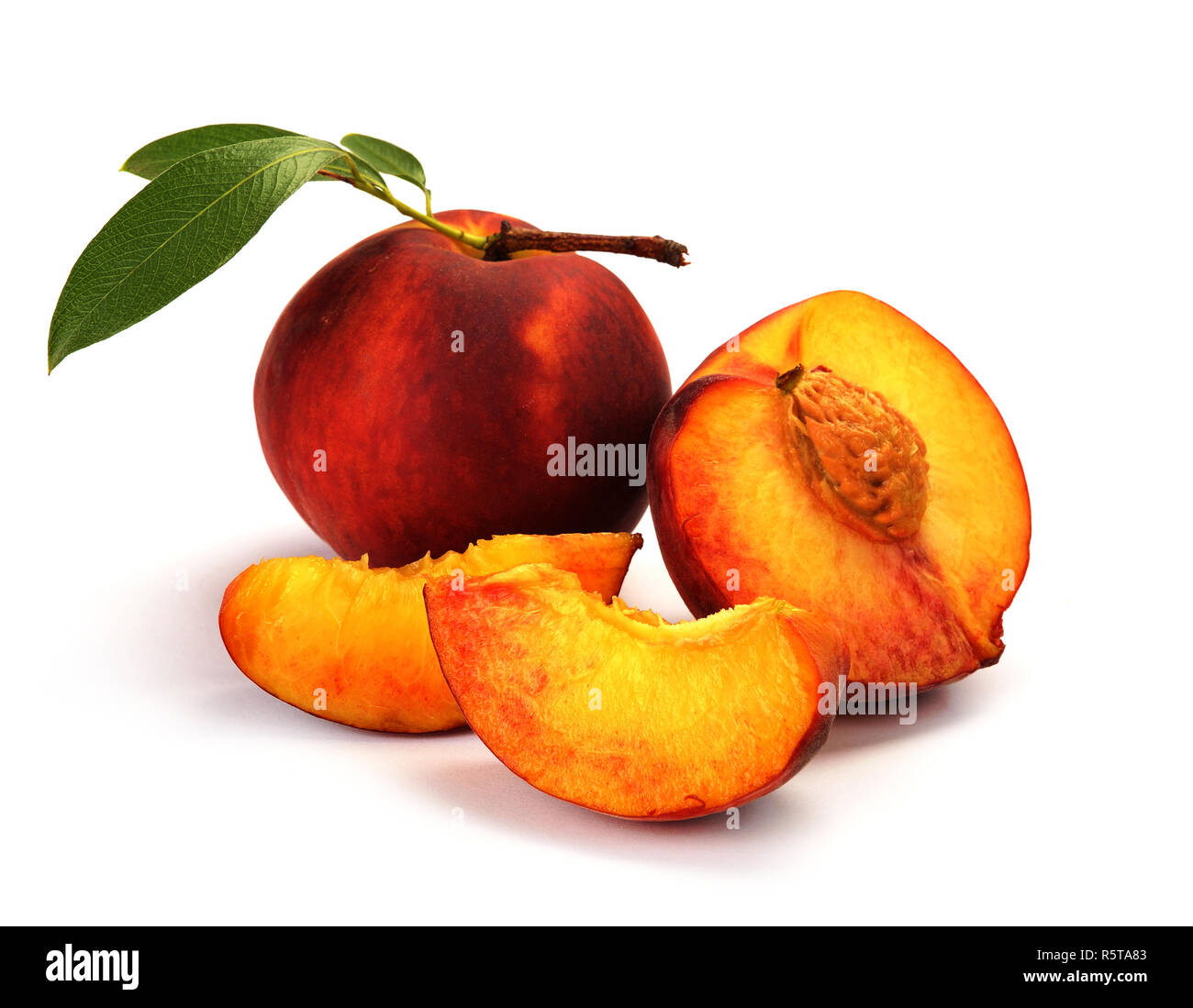 Fresh peach with green leaf isolated on white background. Peach in a ...