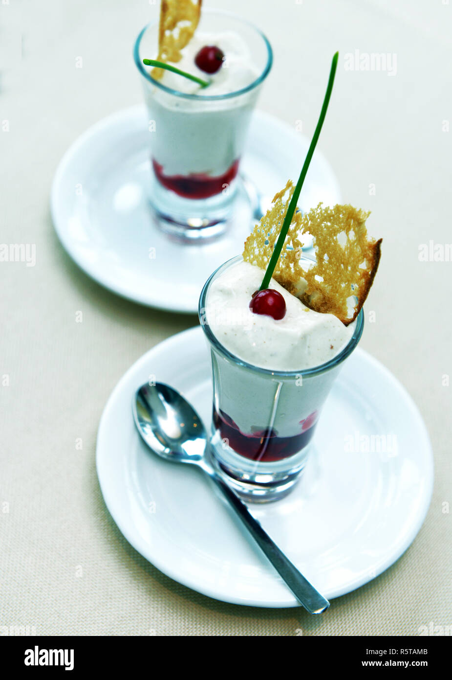 Italian cheese mousse with berry sauce Stock Photo - Alamy