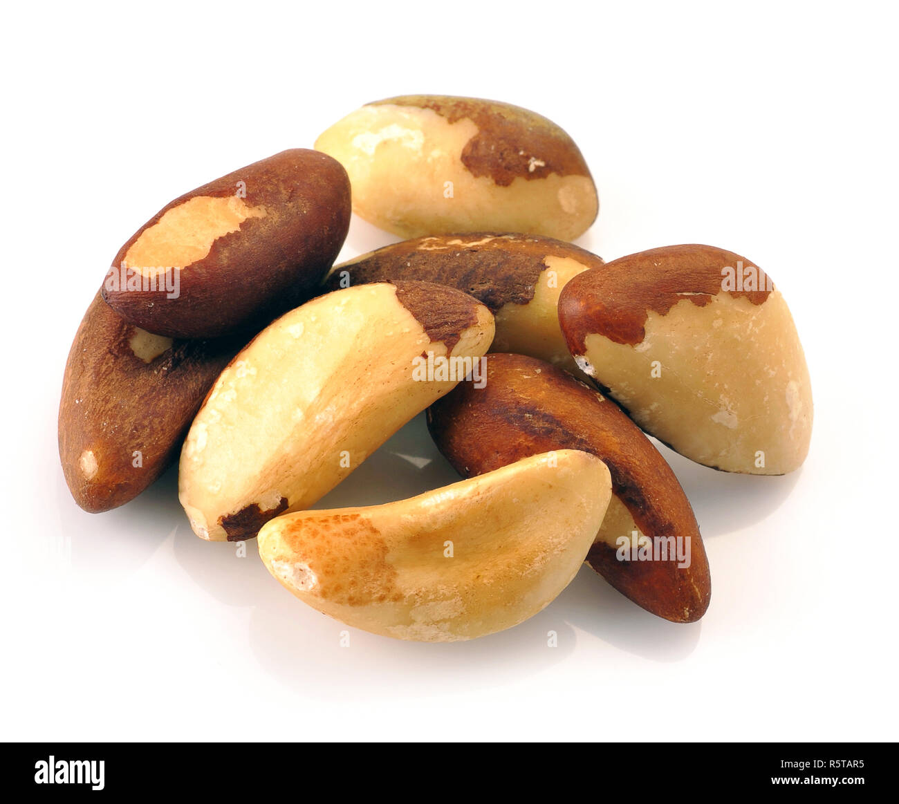 Brazil nuts close-up isolated on white background Stock Photo - Alamy